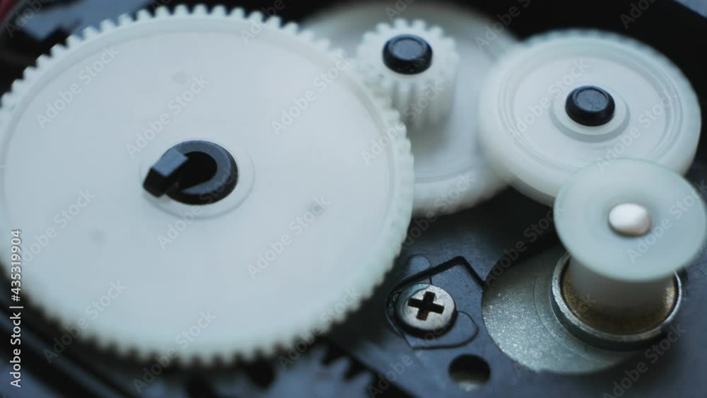 Internal Working Mechanism with Rotating Gears. Rotating black and ...