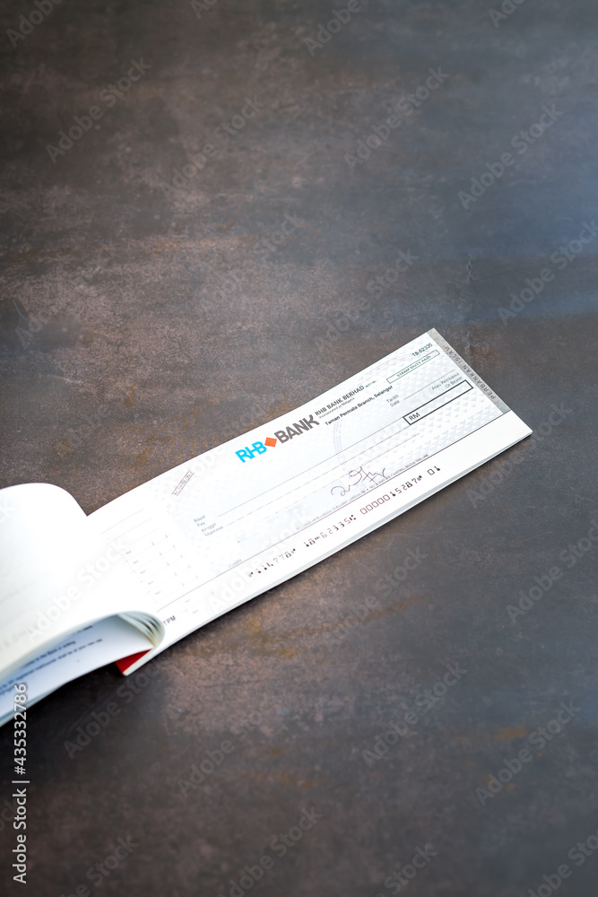 Kuala Lumpur, Malaysia - May, 2021 Empty cheque book from RHB bank ...