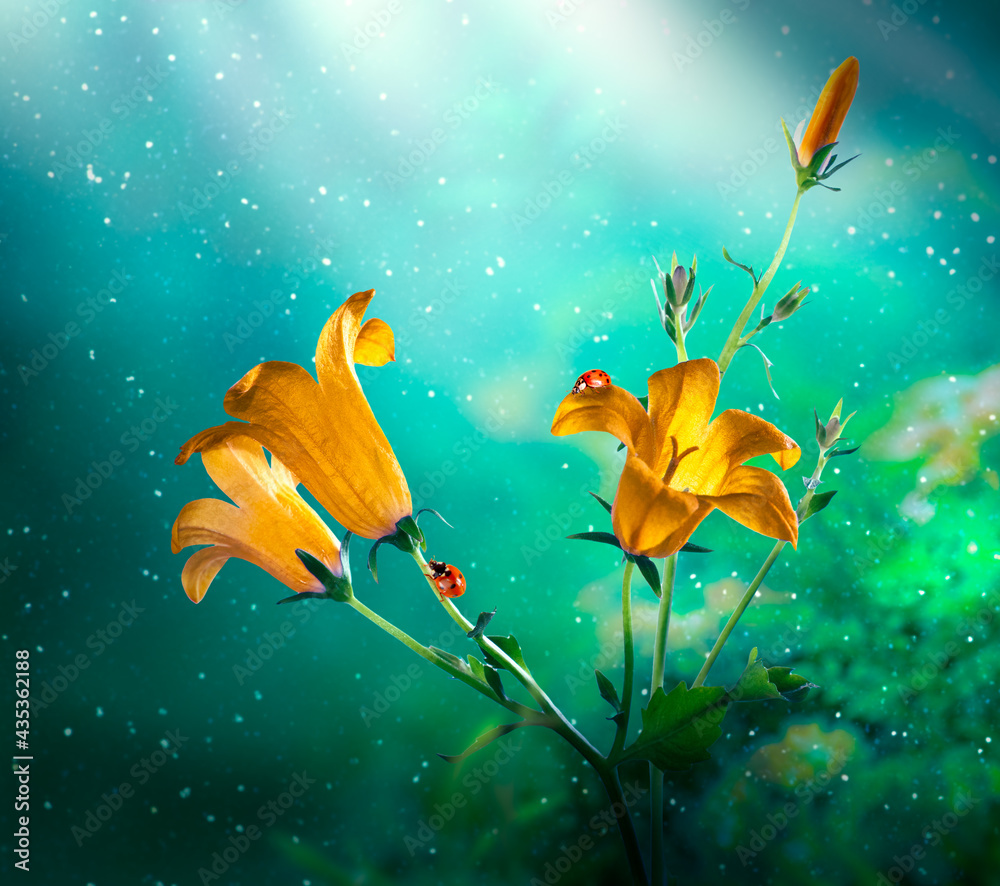Golden Bluebells Flowers in Fantasy magical Emerald color garden in ...