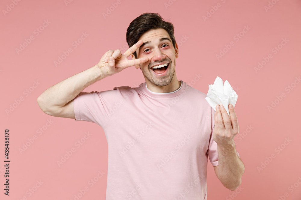 Sick ill allergic happy fun smiling adult man wear rozy t-shirt has red ...