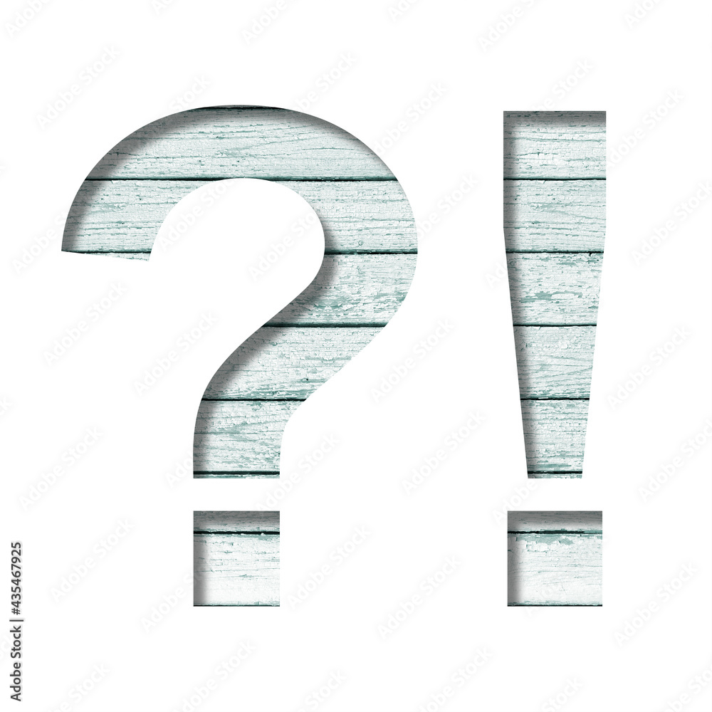Font on old boards. Exclamation and question marks cut out of paper on ...