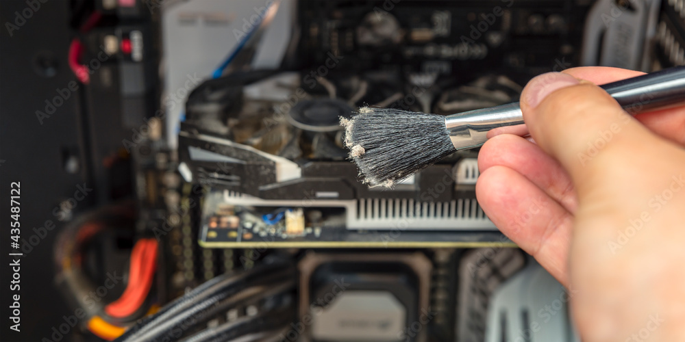 Clean your computer from dust. Cleaning a dirty computer from dust with ...