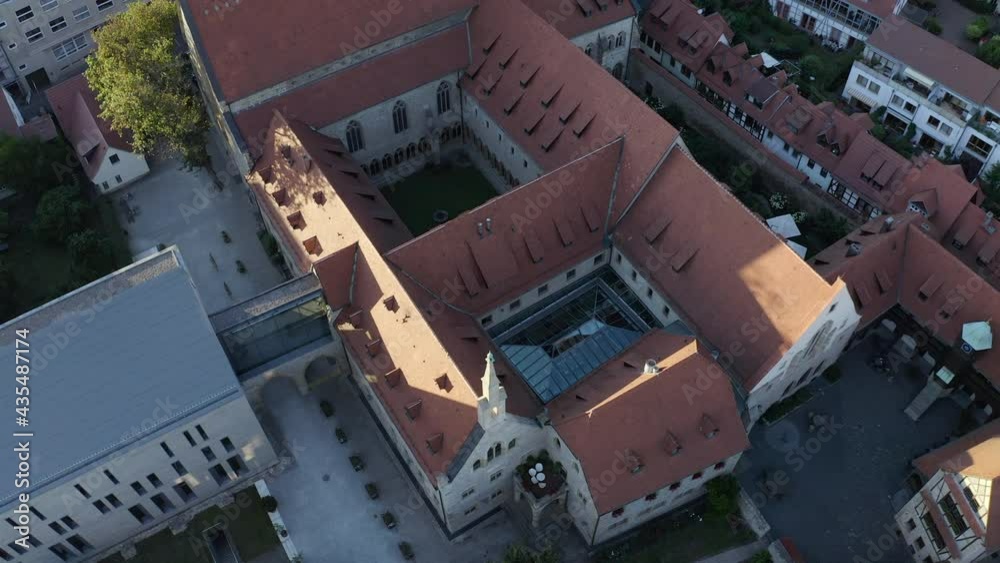 Aerial: Rising Above And Panning A German Monastery Nestled In An Old ...