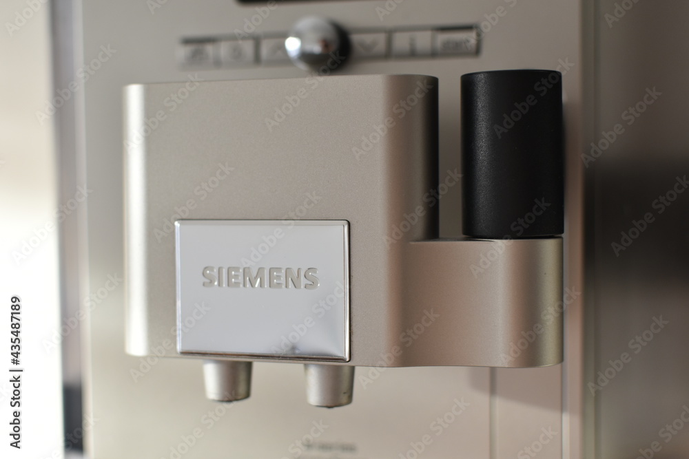 Siemens logo on coffee machine EQ.7 plus Stock Photo | Adobe Stock