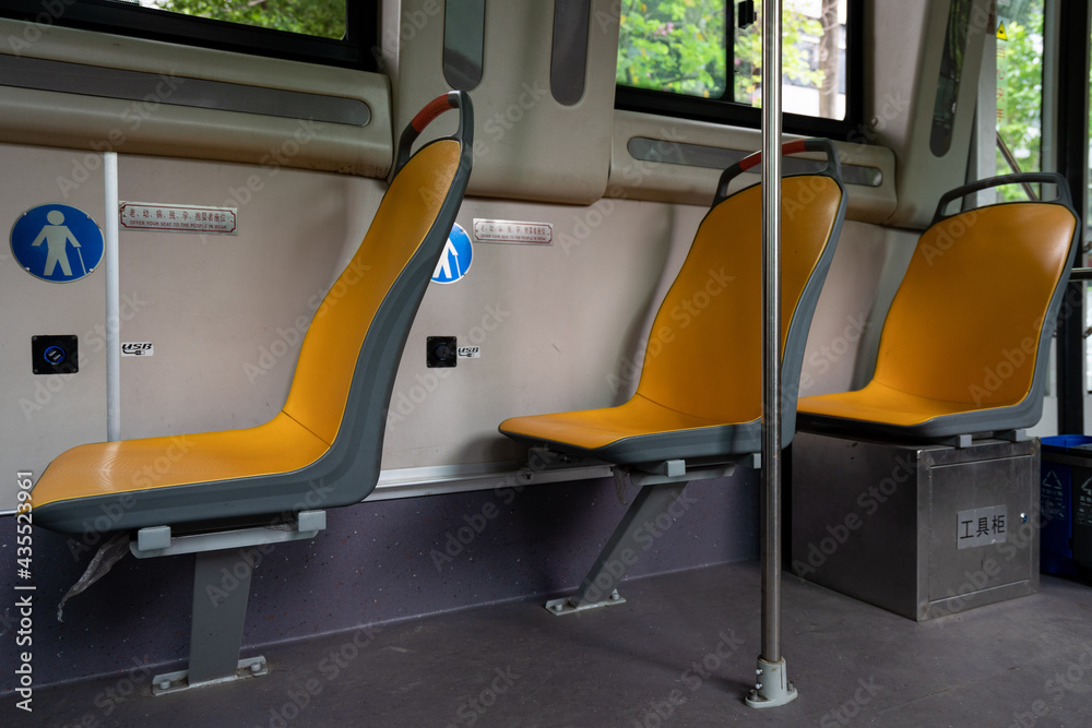 Yellow seats on buses Stock Photo | Adobe Stock