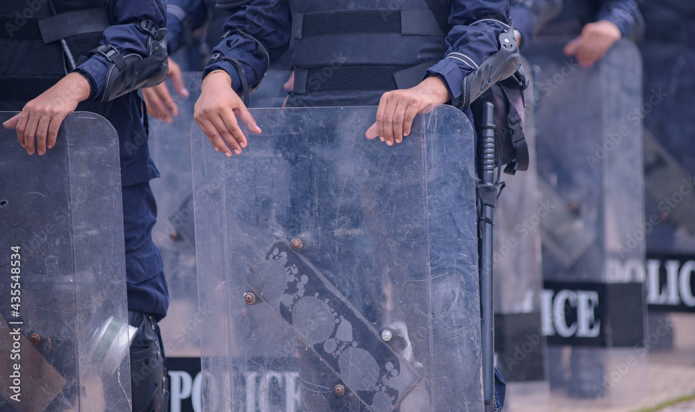 Riot police practice shields and baton Stock Photo | Adobe Stock