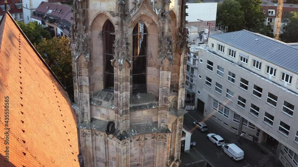 Aerial: Panning Up The Pinnacles Of A Bell Tower On An Old German ...