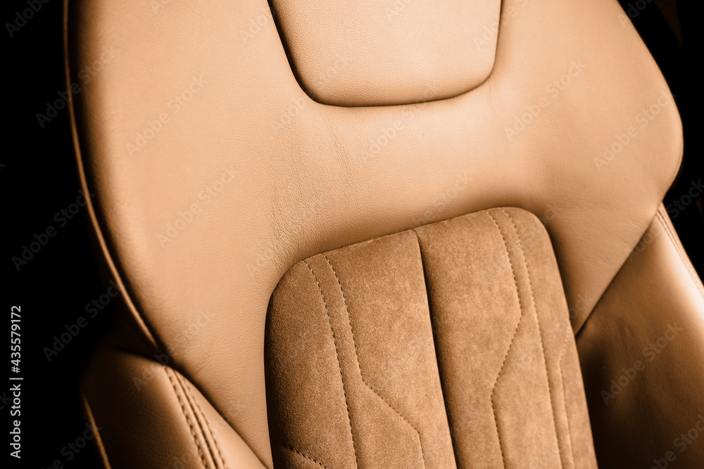 Modern luxury car brown leather with alcantara interior. Part of orange ...