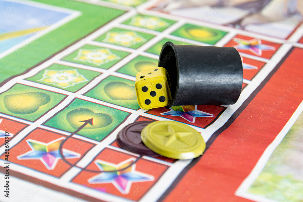 ludo board dice and pawn, ancient traditional village time passing ...