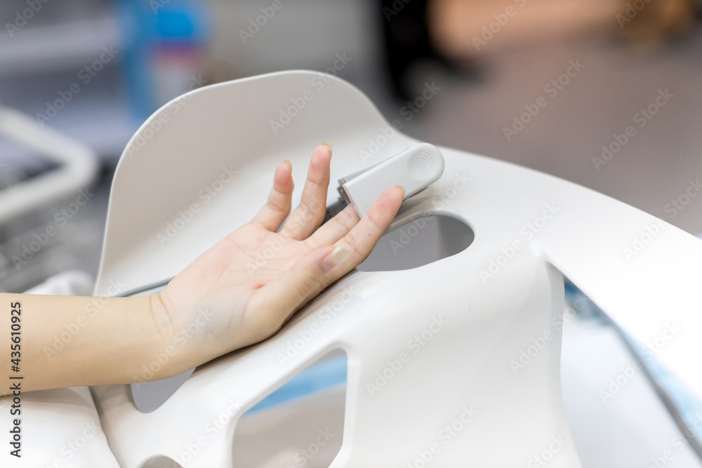 heart rate monitor clipper clipped on the finger for checking heart ...