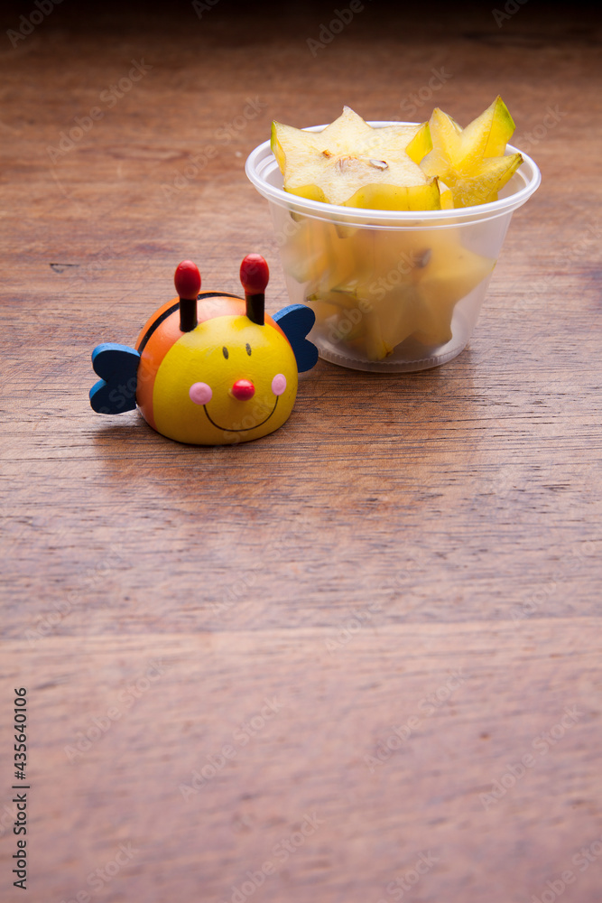 School lunch box snacks for kids over wooden background. Back to school ...