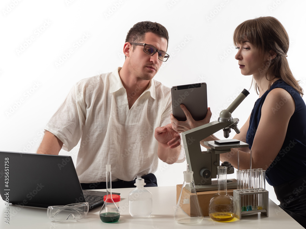 Modern researchers. Scientists at work. Two researchers are working in laboratory. Laboratory ...