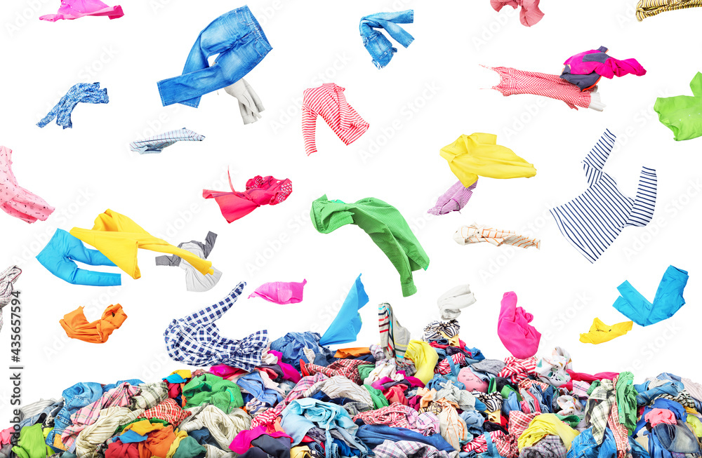 Separate clothing falling at the big pile of clothes on a white ...