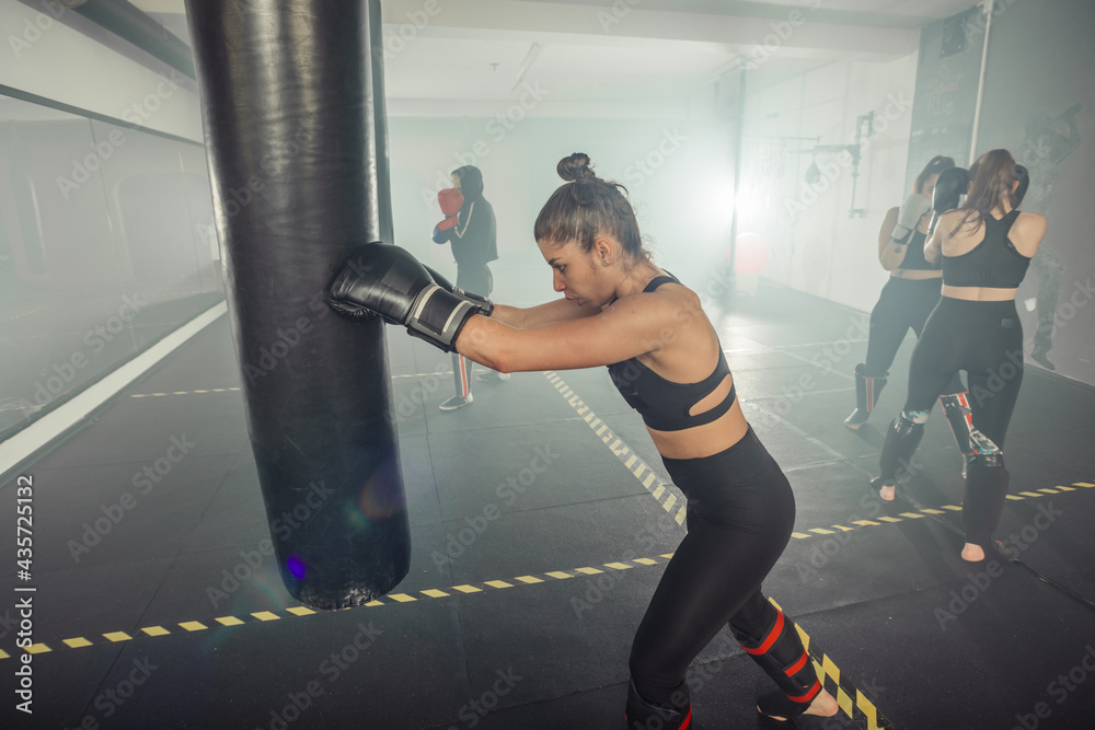 Boxer woman. Boxing fitness woman smiling happy wearing black boxing ...
