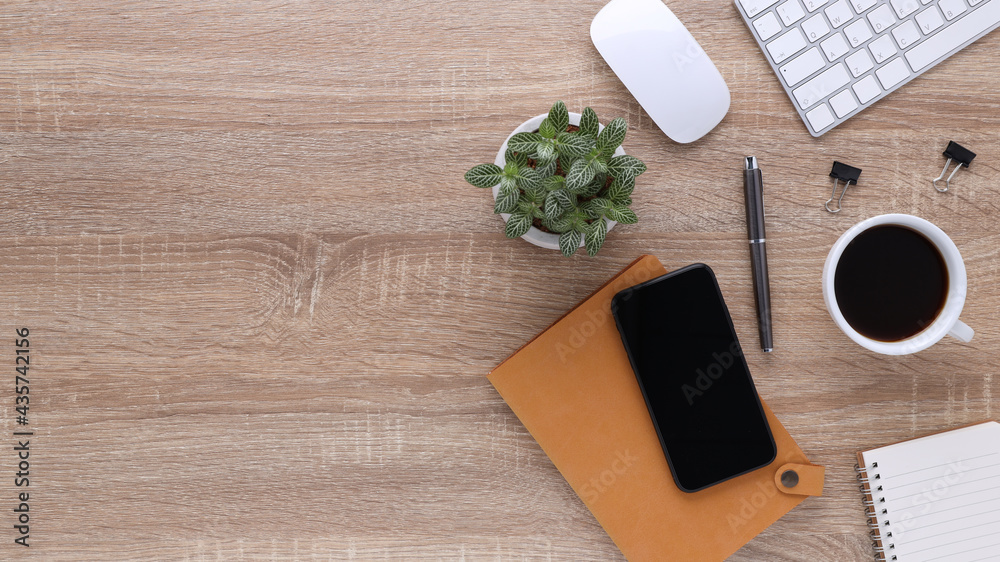 Top view wooden workspace office desk with computer and office supplies ...