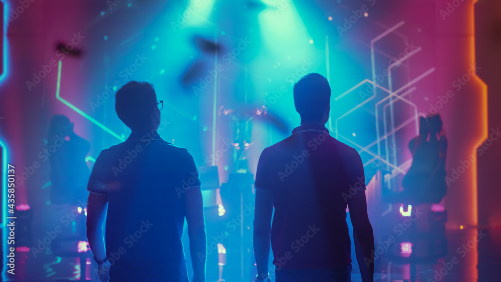 Two Professional eSports Gamers walking on Stage to Participate in the ...