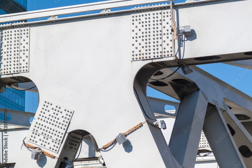 part of rivet joints of the high load bridge construction. parts of a ...