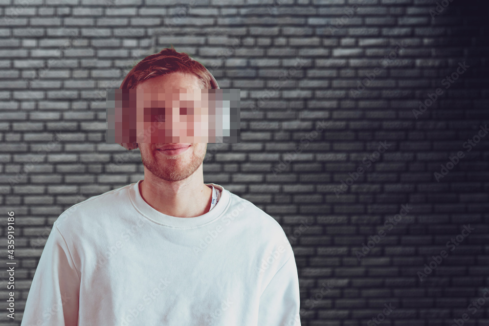 portrait of person with censored pixels tab on the face, personal ...