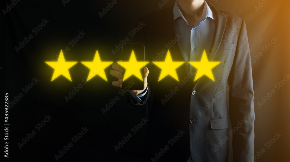 Man hand showing on five star excellent rating.pointing five star ...