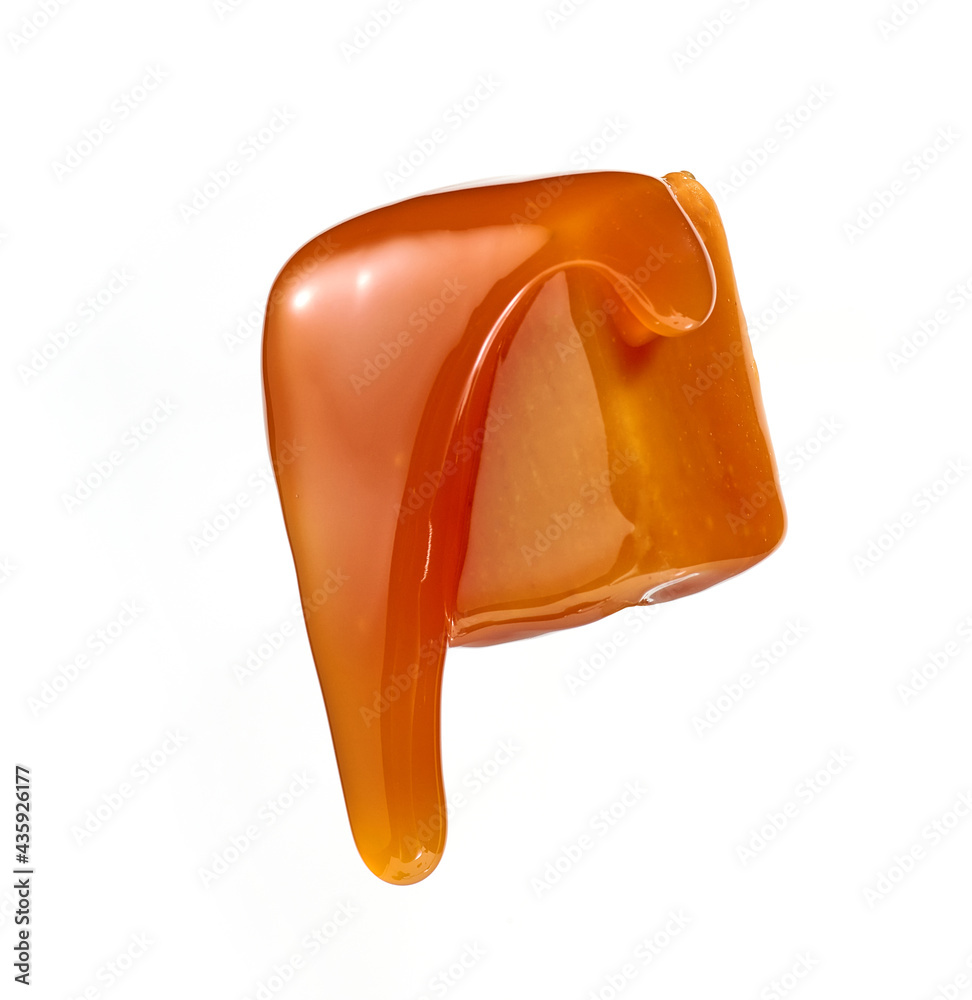 caramel sauce flowing on flying caramel candy Stock Photo | Adobe Stock
