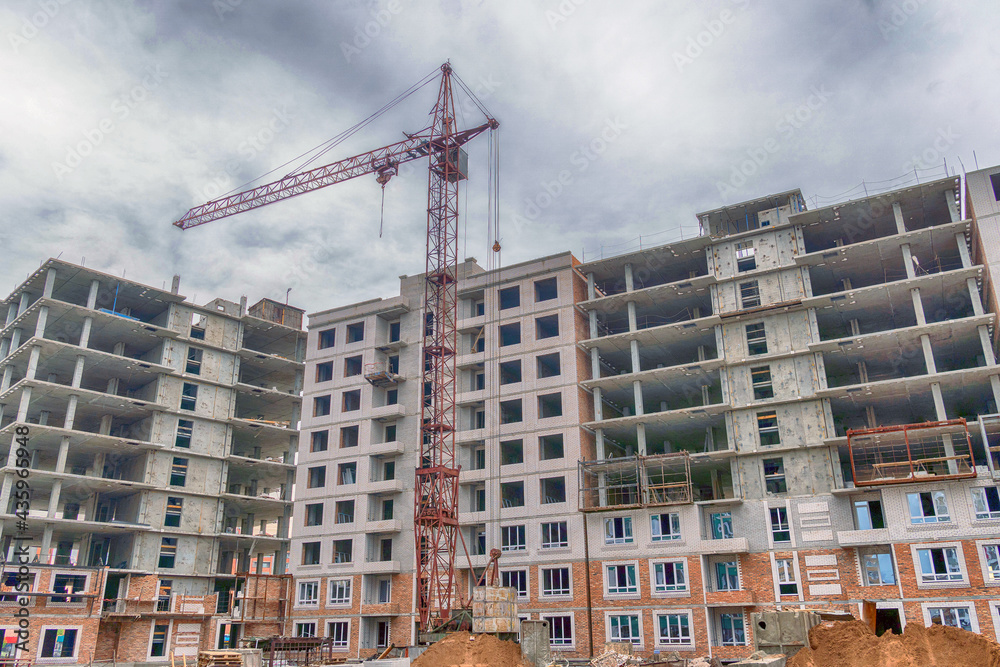 Tower crane at the construction site of a high-rise apartment building ...