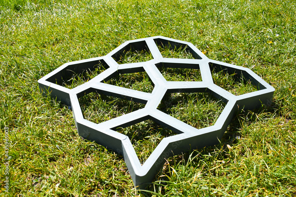 Polymeric, plastic form for laying out concrete garden paths in summer ...