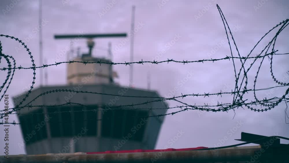 Video Stock Sharp razor wire fence at private save zone. Barbed tape ...