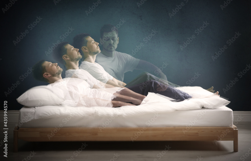 Somnambulist rising from bed near dark wall indoors, multiple exposure ...