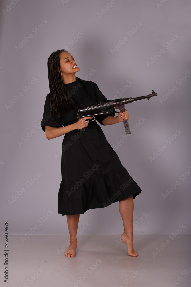 Woman With Machine Gun