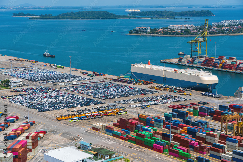 Car carrier and lined up import/Export cars at the sea terminal. Stock ...