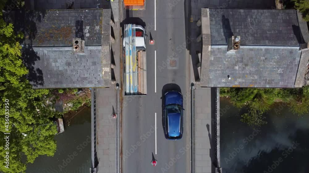 Top down of an old stone bridge with toll buildings incorporated ...