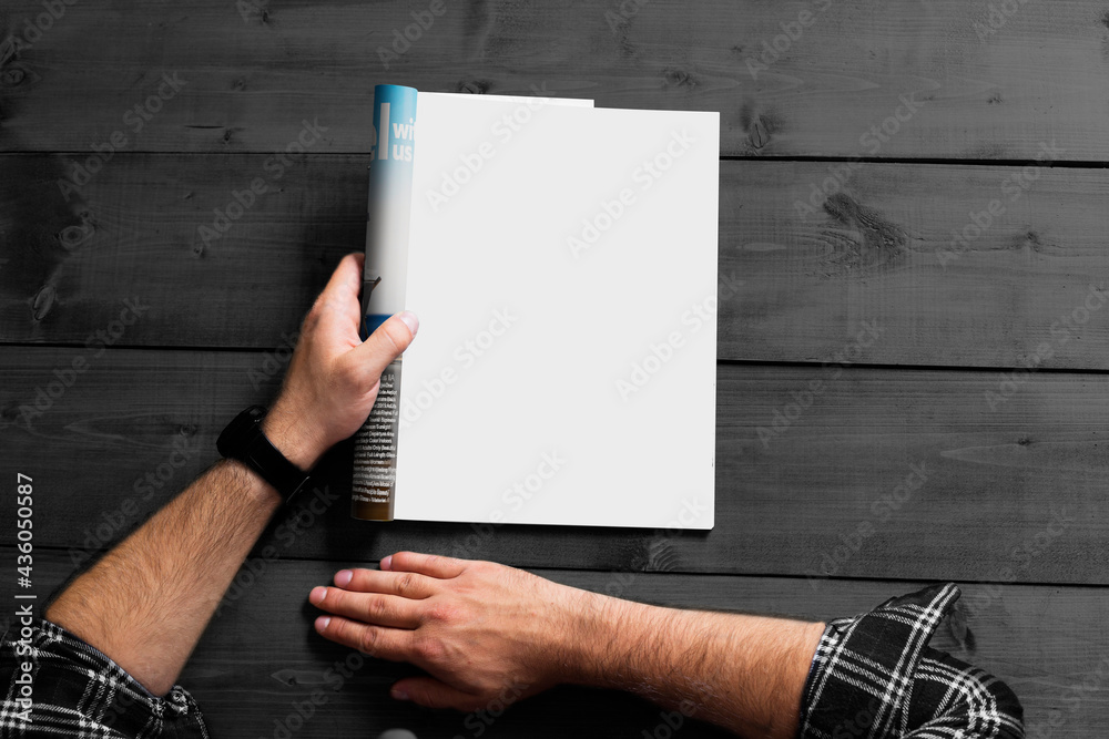 Magazine mock up. Clean page of magazine with male hands background ...