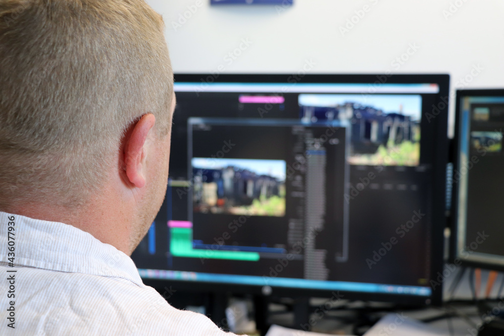 Man Editing Video in Adobe Premiere Pro. Stock Photo | Adobe Stock