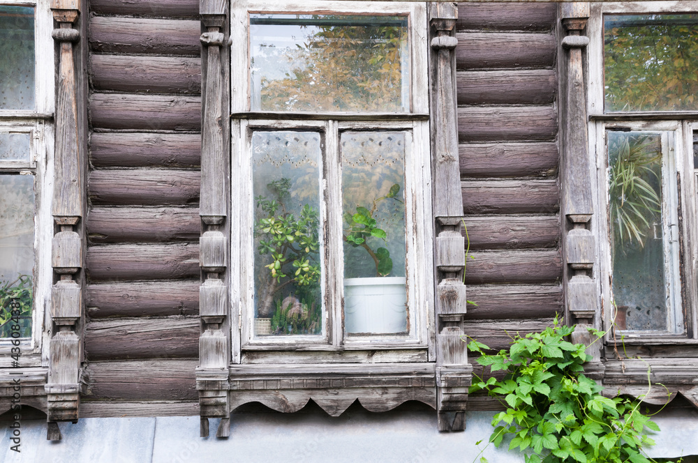 Fragment An old Russian window with carved decorations from the times ...