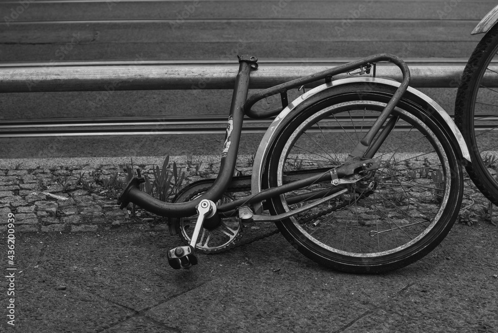 An old junk bike attached to a railing, old junk bike, a half bike, black and white photo Stock ...