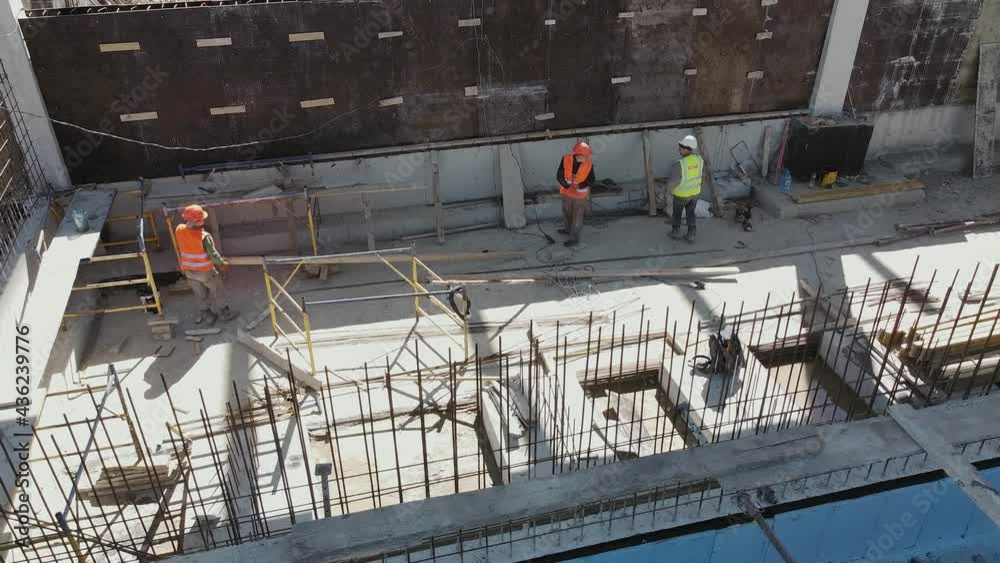 Large construction site of residential building with workers. Modern ...