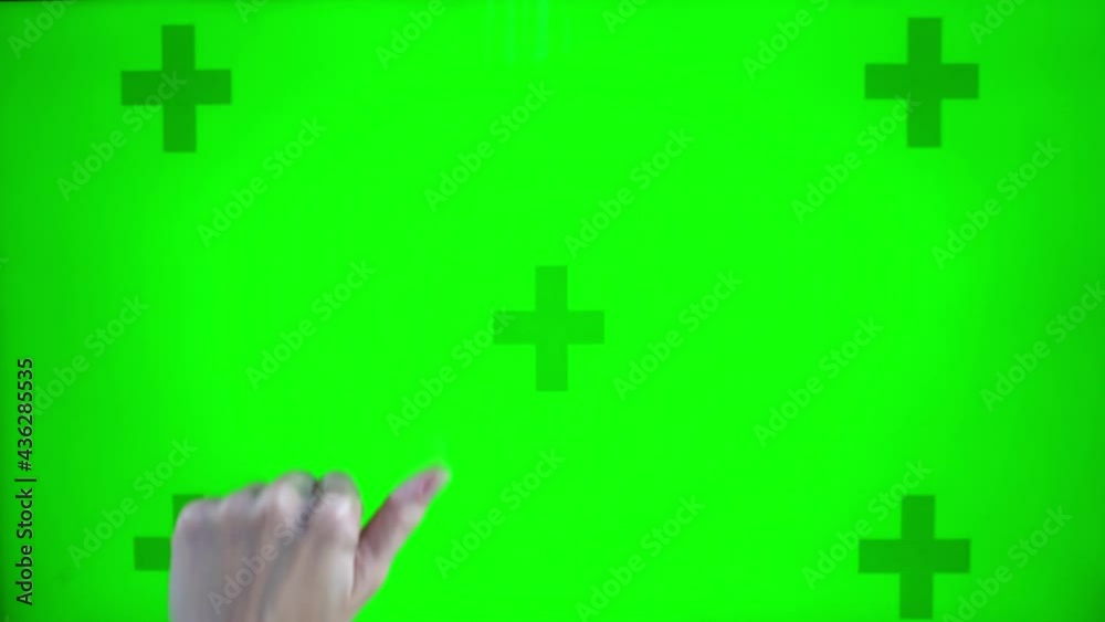 click of the hand on background of chroma key on computer monitor ...