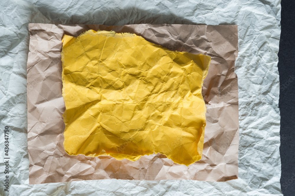 crumpled paper background - layered yoke yellow, beige, and off white ...