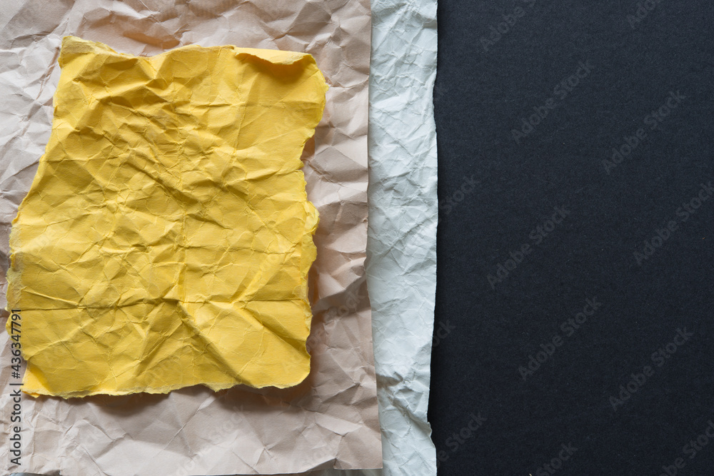 crumpled paper background - layered yoke yellow, beige, and off white ...