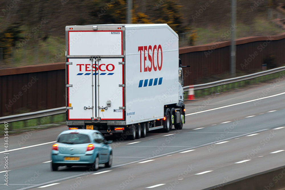 Tesco lorry travelling on British motorway M25 Stock Photo | Adobe Stock