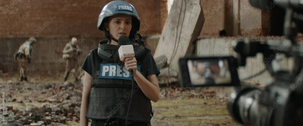 Behind the scenes of female war journalist correspondent wearing ...