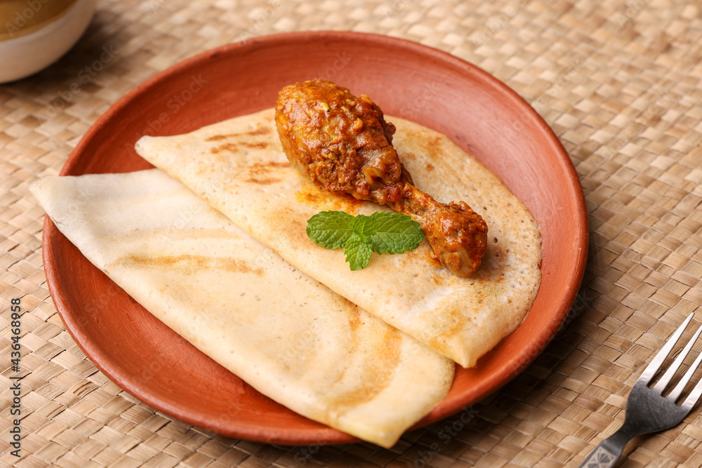 Dosa , Dosai, ghee roast with chicken curry popular South Indian ...