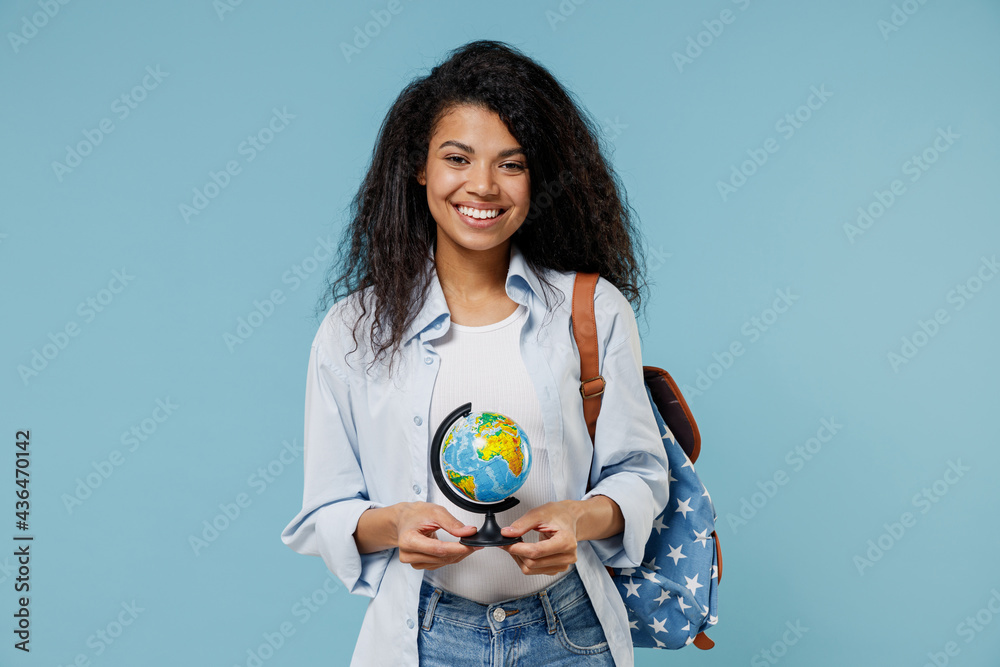 Young smiling african american girl teen geography student wear denim ...