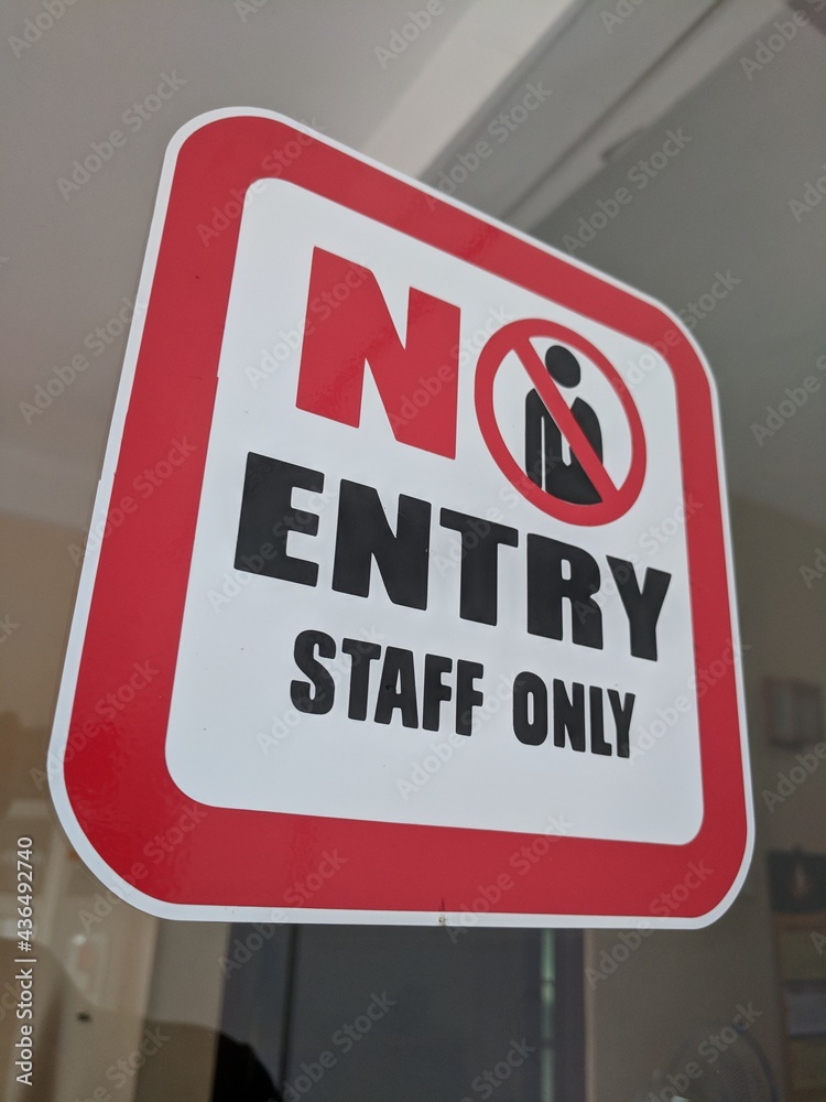 No entry staff only sign stick on a front glass door Stock Photo ...