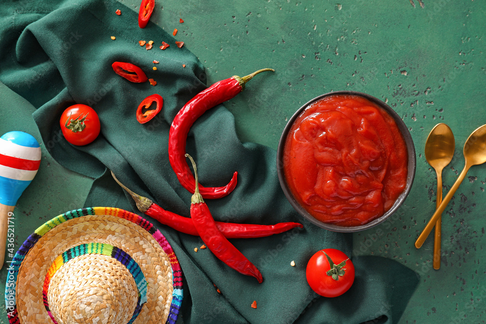 Composition with tasty chili sauce and ingredients on color background ...