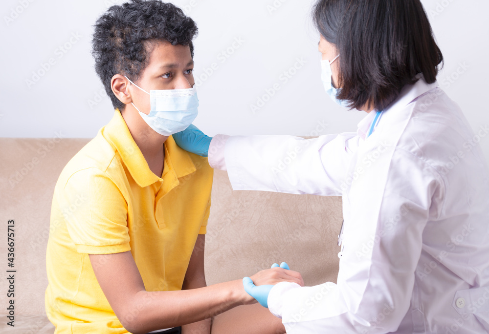 Medical care, Woman doctor wearing facemask taking care patient, Male ...