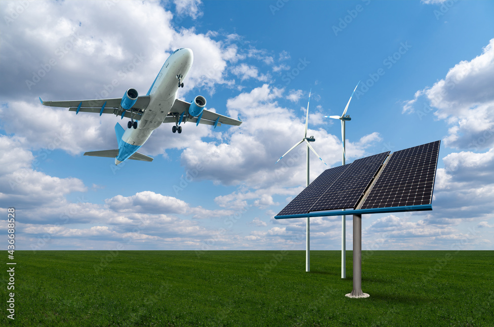 Landing plane with solar panels and wind turbines. Clean mobility ...