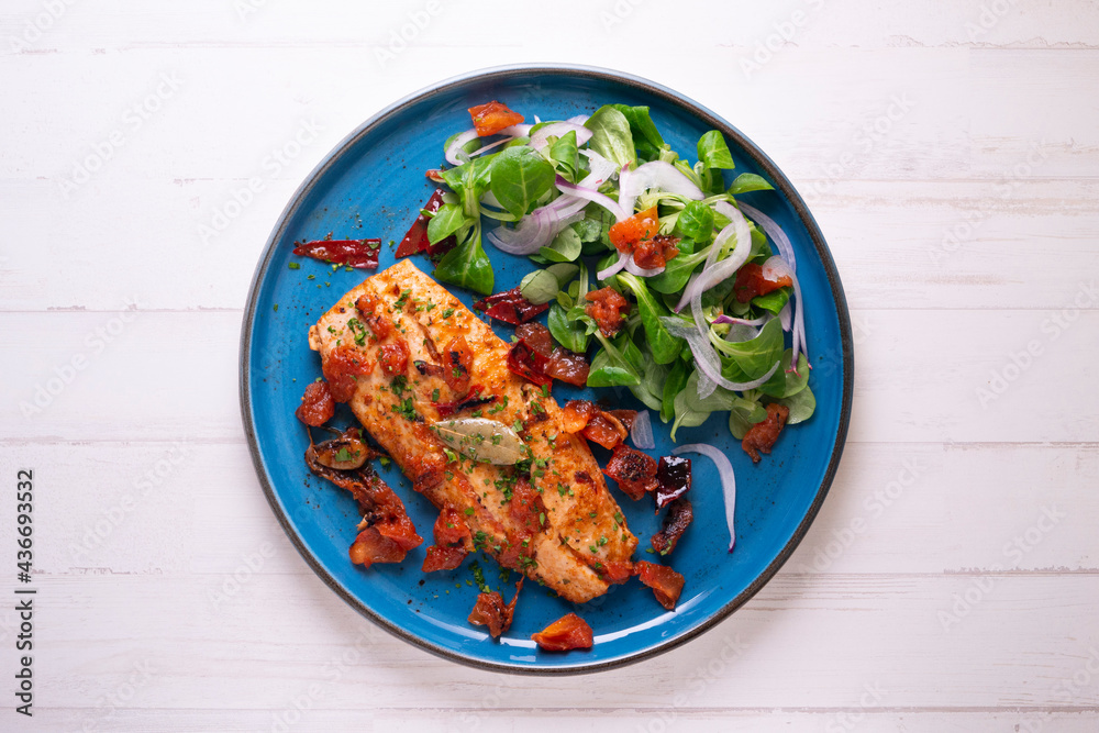 Grilled palometa fish with chili and onion. Traditional tapa from ...