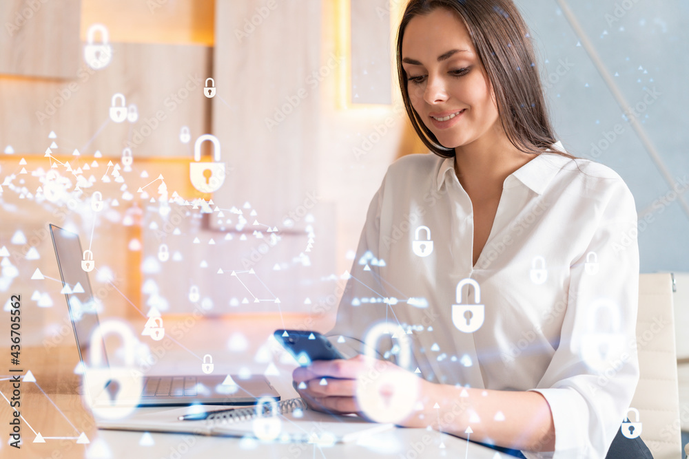 Attractive businesswoman in white shirt checking cyber security using ...
