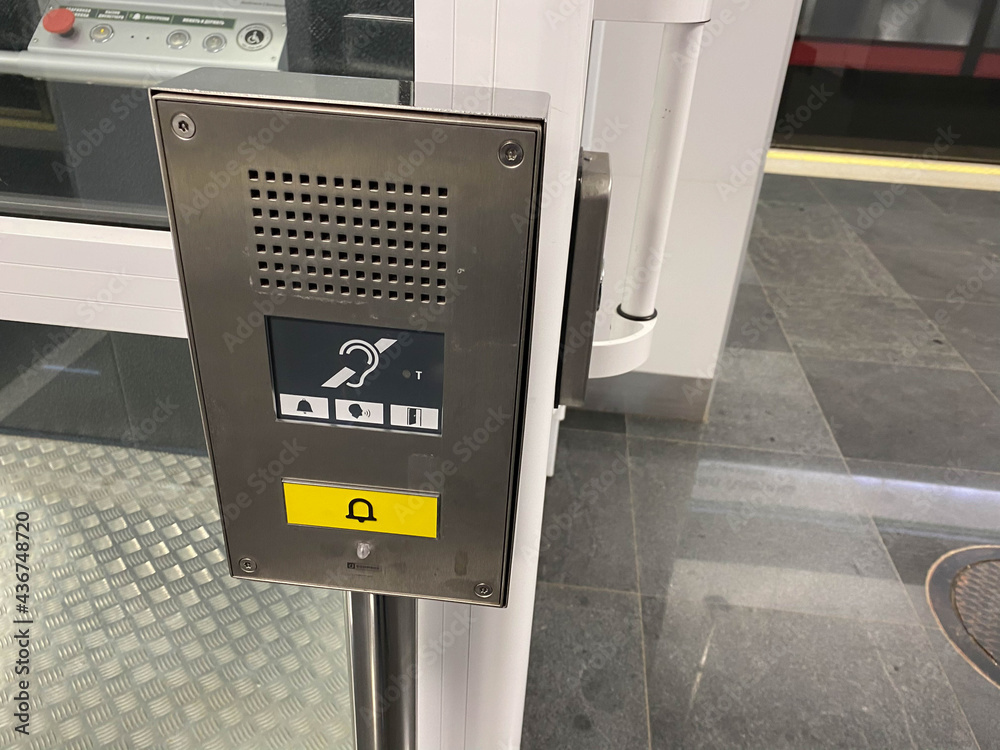 Large call button for an inclusive elevator in the subway or shopping ...